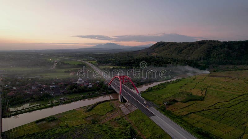 Aerial View of the Kalikuto Bridge, an Iconic Red Bridge at Trans Java ...