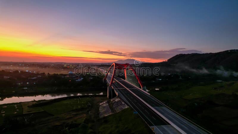 Aerial View of the Kalikuto Bridge, an Iconic Red Bridge at Trans Java ...