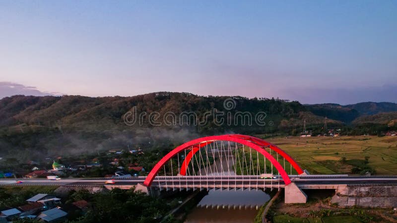 Aerial View of the Kalikuto Bridge, an Iconic Red Bridge at Trans Java ...