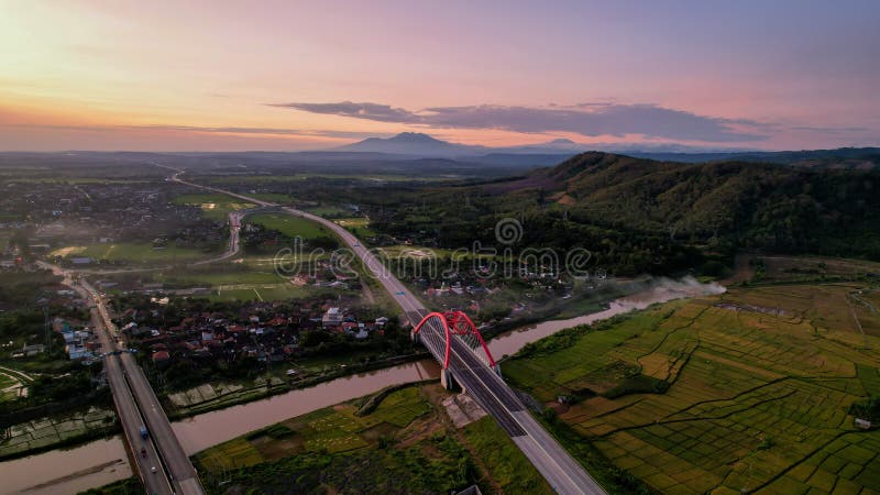 Aerial View of the Kalikuto Bridge, an Iconic Red Bridge at Trans Java ...