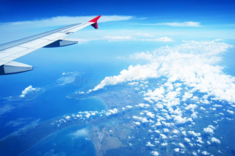 Aerial View of Land and the Ocean from Airplane Stock Image - Image of ...
