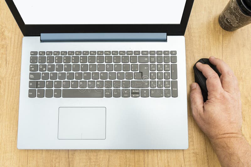 Aerial View of a Laptop and a Man Moving a Mouse To the Side Stock ...