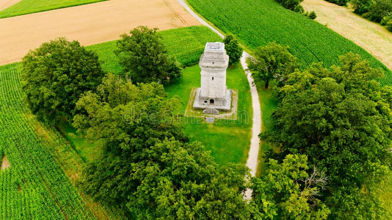 Aerial View of Large Field of Green Grass with a Small Building in the ...