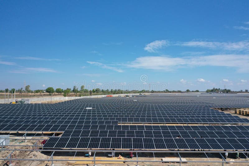 Aerial View of a Large-scale Solar Farm with an Array of Black Solar ...
