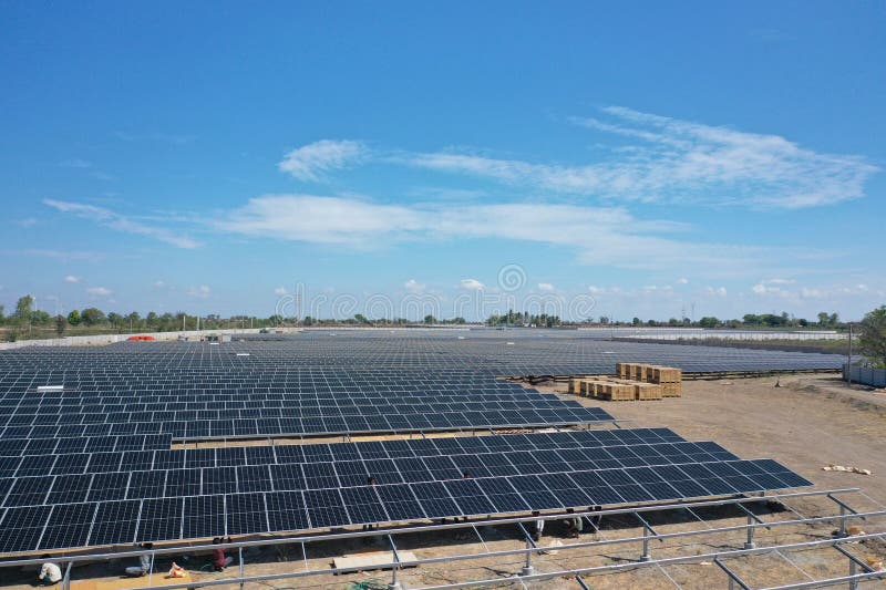Aerial View of a Large-scale Solar Farm with an Array of Black Solar ...