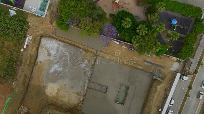 Aerial View: a Lively Foundation Pouring Scene Shows Concrete Flowing ...