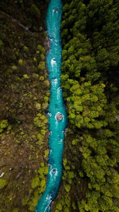 Aerial View of a Long and Narrow River with Blue Water in a Thick ...