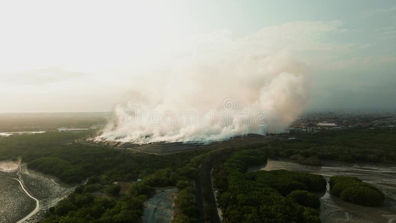Aerial View of a Long-range Fire at a Large Landfill with Garbage ...