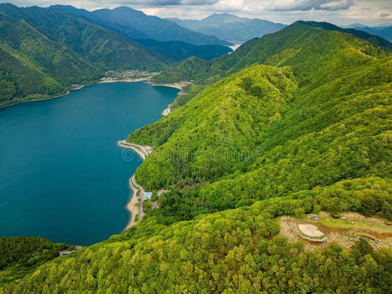 Aerial View of Lush Forest, Mountains and an Observation Point Above a ...