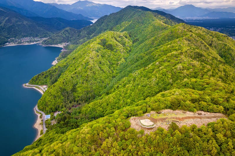 Aerial View of Lush Forest, Mountains and an Observation Point Above a ...