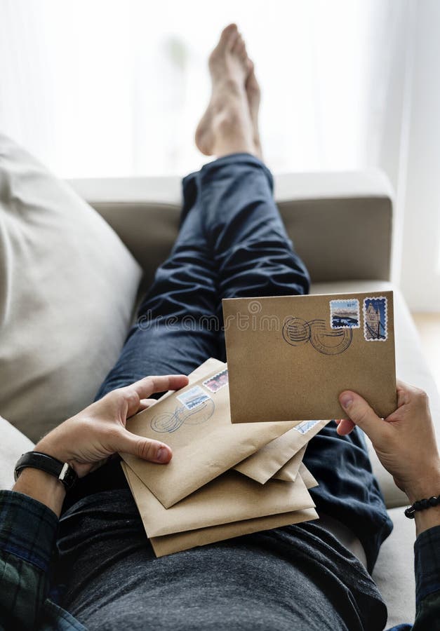 Aerial View of a Man Sorting an Envelope Stock Image - Image of post ...