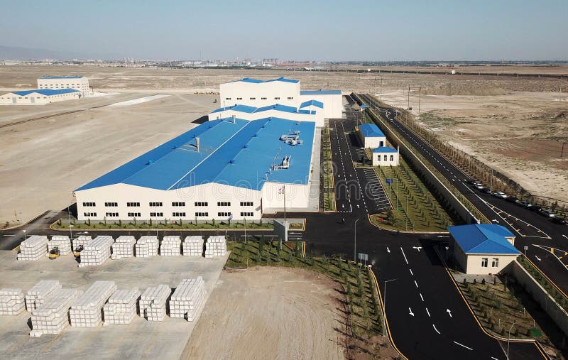 Aerial View of Many Trucks at the Loading Docks of a Large Distribution ...
