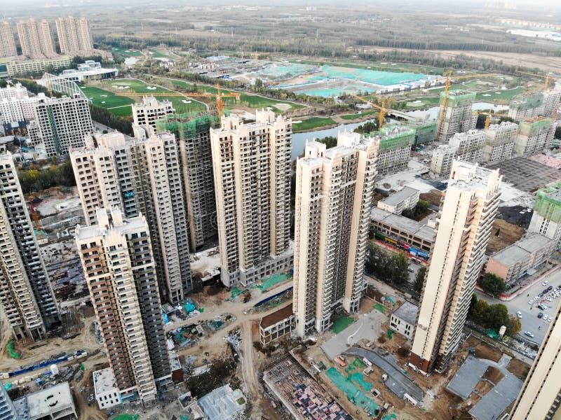 Aerial View of Massive Identical Buildings Site in Construction with ...