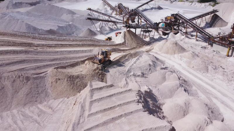Aerial View of a Mining Crawler Bulldozer in Work in Limestone Quarry ...