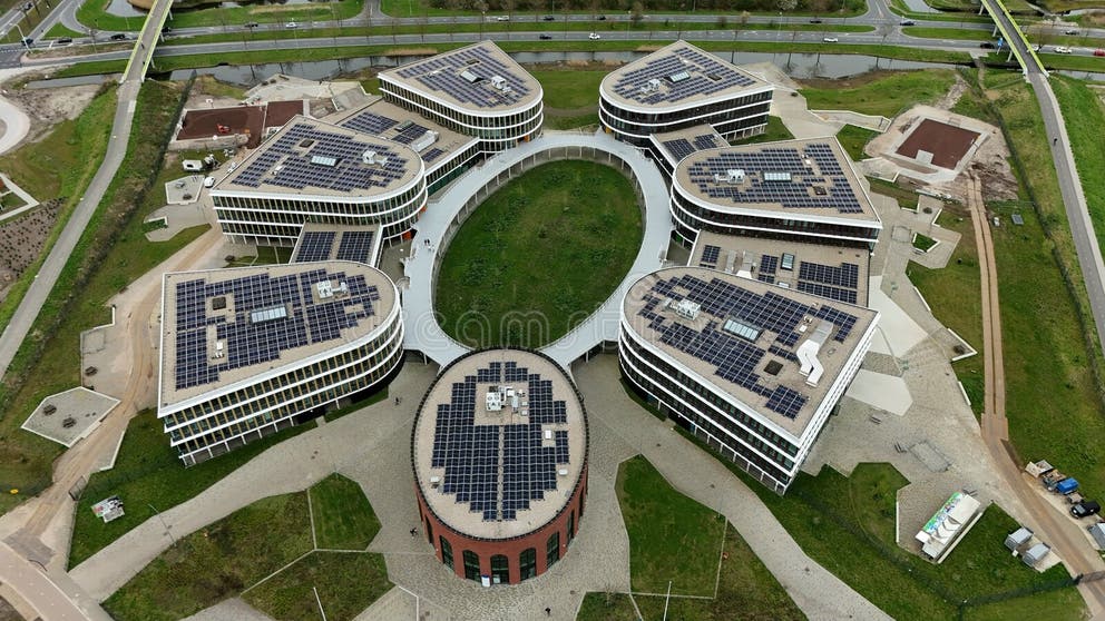Aerial View of a Modern Office Complex with Distinctive Circular and ...