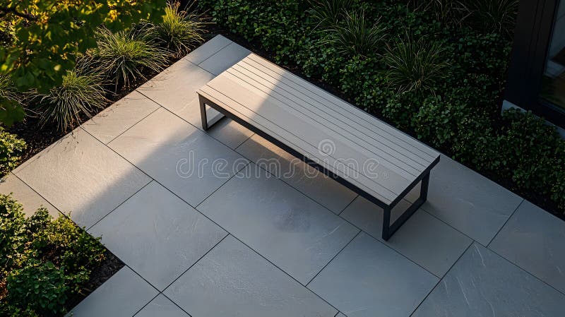 Aerial View of a Modern Outdoor Bench Surrounded by Lush Greenery in a ...