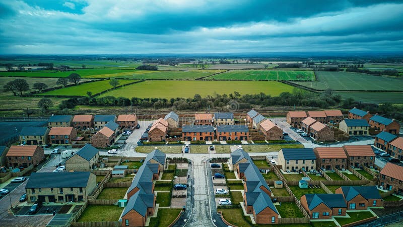 Aerial View of a Modern Residential Housing Development Amidst Green ...