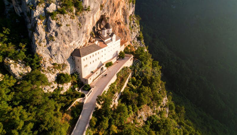 Mountain Monastery Nestled in a Cliffside Stock Photo - Image of ...