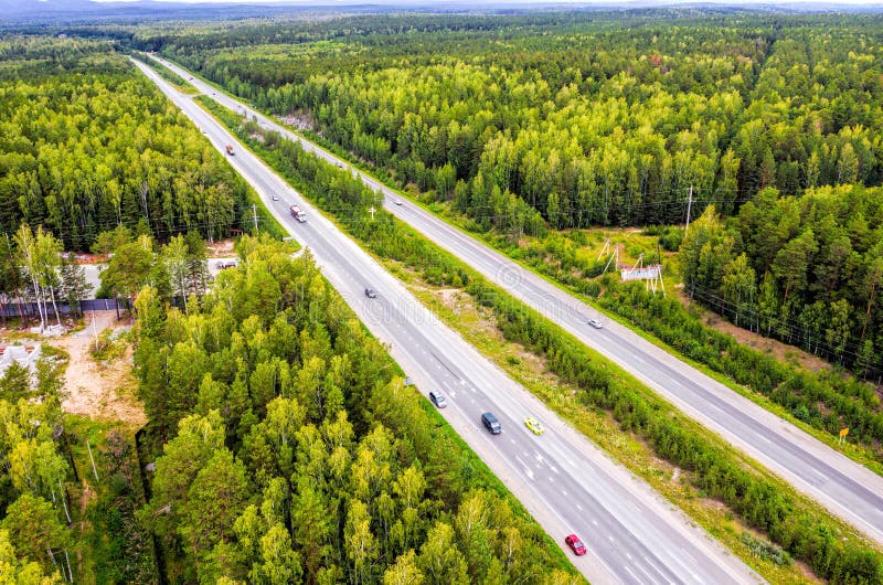 Aerial View of Movement of Cars on the Motorway through Forest Stock ...