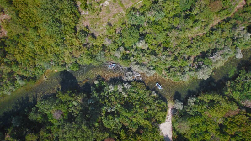 Aerial View of Multiple Rafts on a River in a Lush Green Forest Stock ...