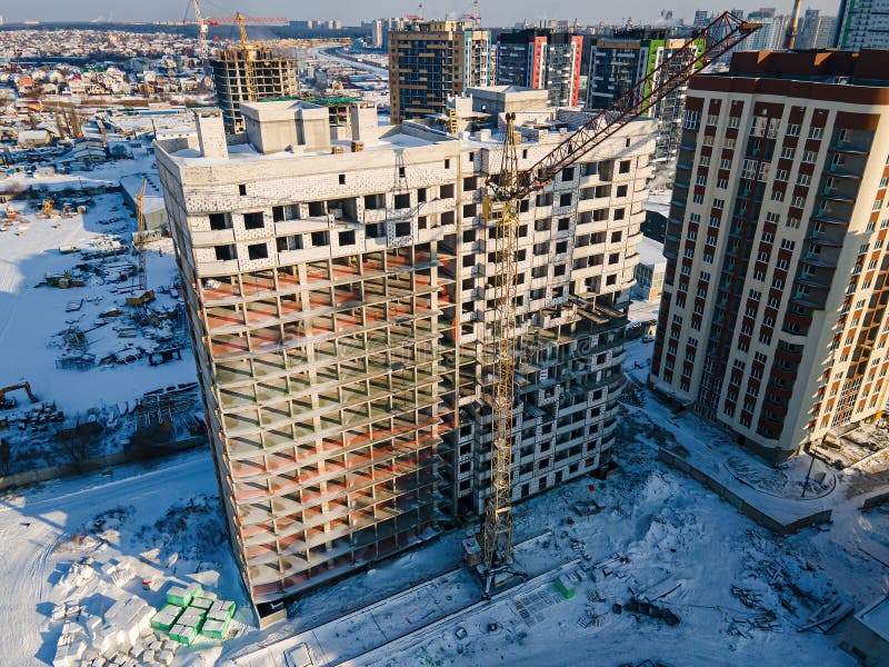 Aerial View of New Constructions Development Site with High Tower Crane ...