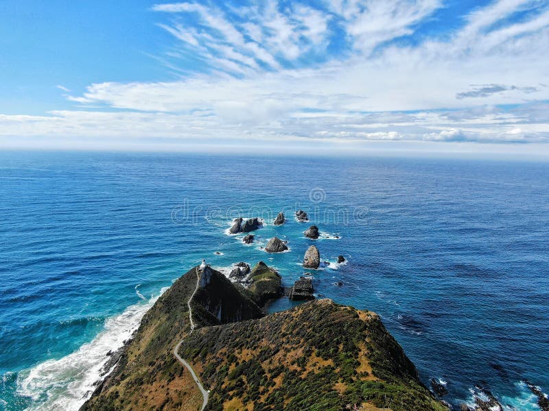 Aerial View of Nugget Point Shore with Lighthouse Stock Photo - Image ...