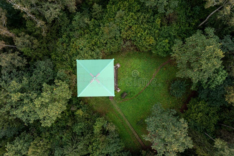 Aerial View of a Observation Tower Cabin Surrounded by Dense Forest ...