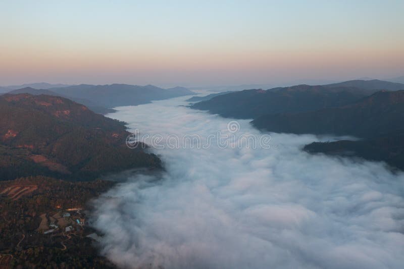 Aerial View of Ocean and Clouds from Airplane Stock Image - Image of ...