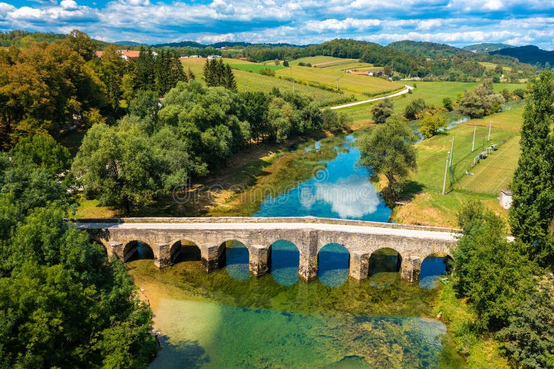 Aerial View of the Old Stone Bridge on the Dobra River Stock Image ...