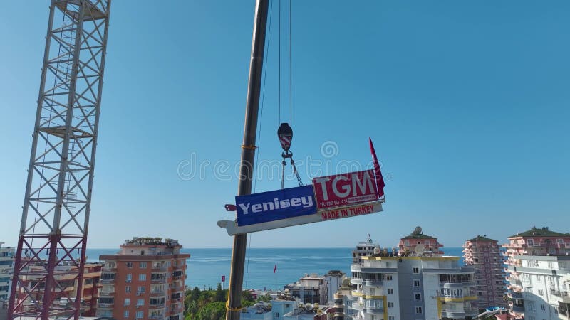 Aerial View: Operator Assembles Crane Components with Skill and Climbs ...
