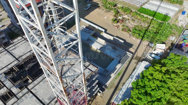 Aerial View: Operator Climbs High Ladders, Assembling Crane Components ...