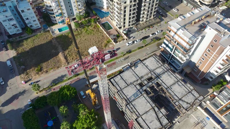 Aerial View: Operator Mounts Large Components while Scaling Ladders ...