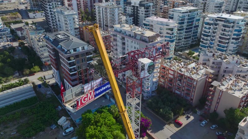 Aerial View: Operator Works High Above, Climbing Ladders and Assembling ...