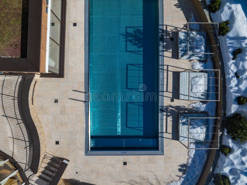 Aerial View of Outdoor Pool in Snowy Resort Setting in Ischgl, Austria ...