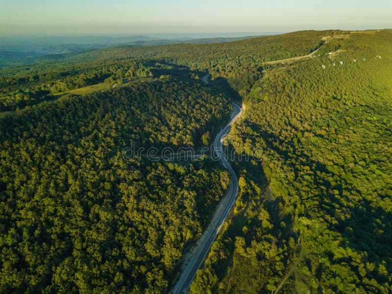Aerial View Over Mountain Curvy Road Going through Forest Landscape ...