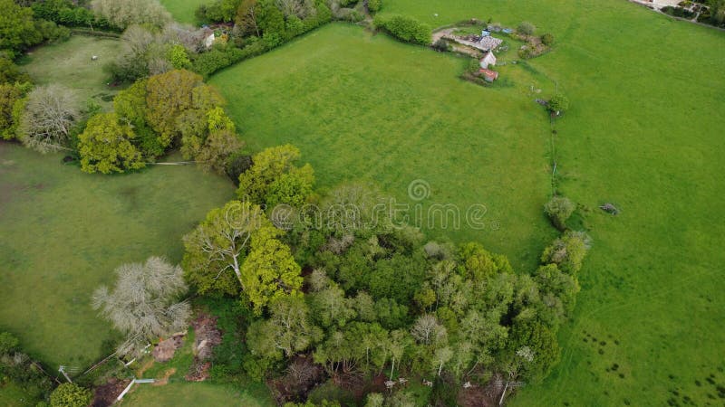 An Aerial View Over Open Countryside with Hedgerows and Rolling Fields ...
