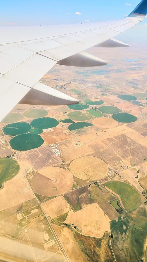 Aerial View of Patchwork Farmland and Airplane Wing Stock Photo - Image ...