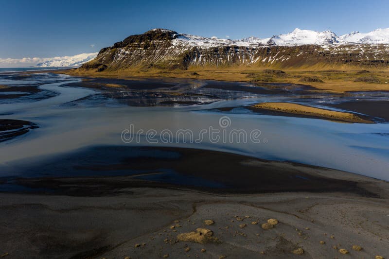 Aerial View of Patterns of Icelandic Rivers Flowing into the Ocean ...