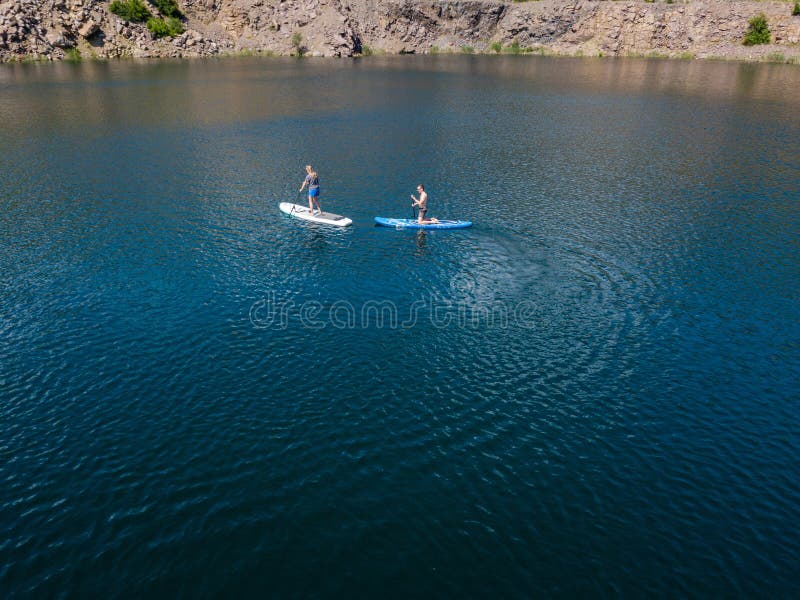 Aerial View on People on Sup Boards with Paddle in the Lake Stock Photo ...