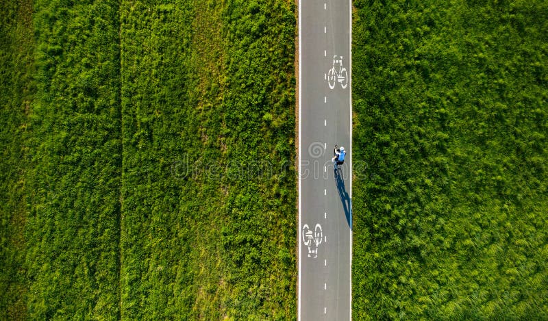 Aerial View of a Person Biking on a Path Stock Image - Image of ...