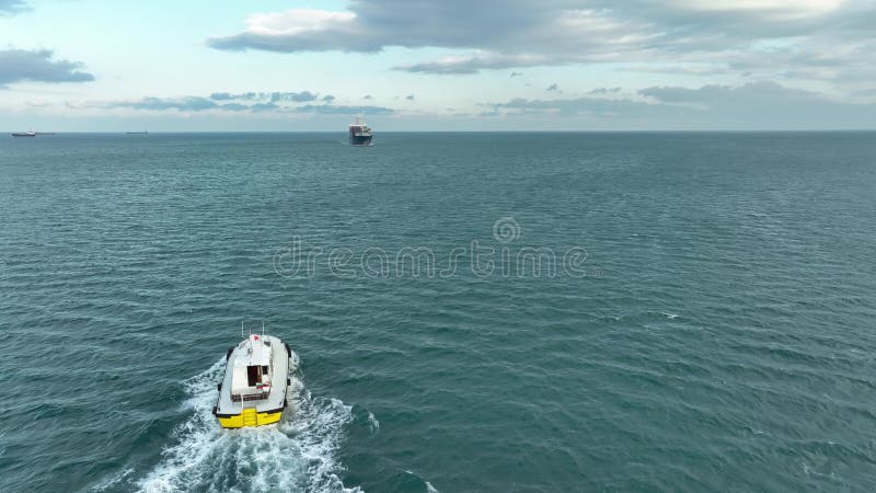 Aerial View of Pilot Boat and Container Cargo Ship Stock Footage ...
