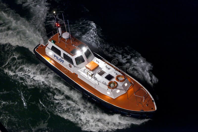 Aerial View of Pilot Boat at Night Stock Image - Image of foam, motor ...