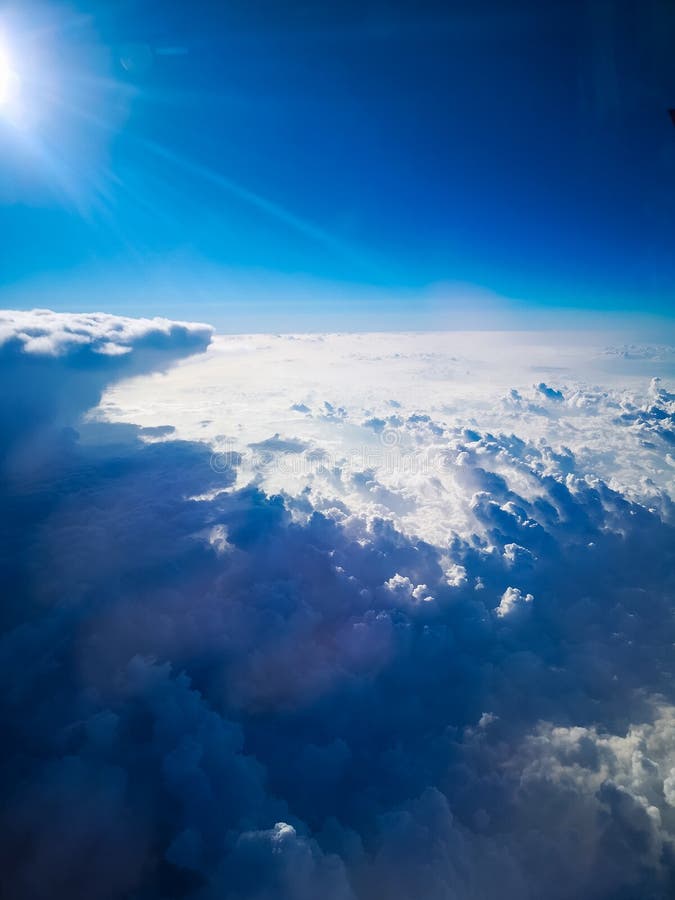 Aerial View from Plane To Morning Sunrise Over Clouds Stock Photo ...