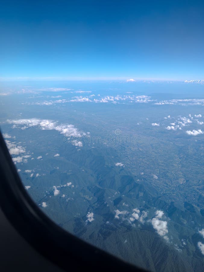 Aerial View from Plane Window with Blue Sky and Clouds Stock Image ...