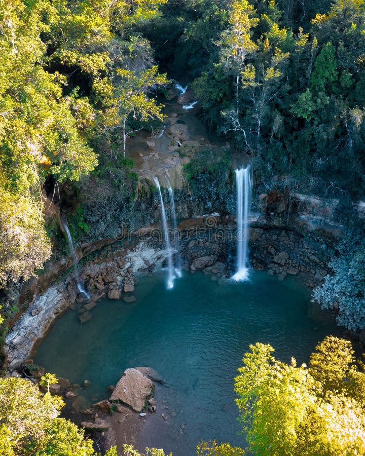 Aerial View of a Raging Waterfall Surrounded by Trees Stock Image ...