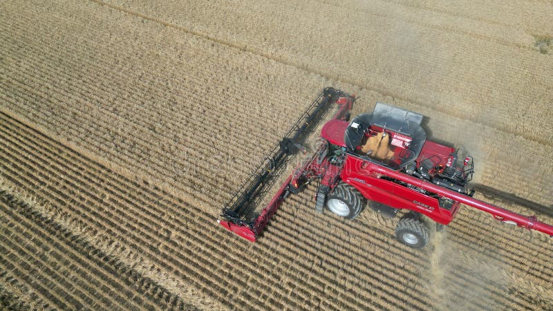 Aerial View of a Red Combine Harvester Working in a Field Editorial ...