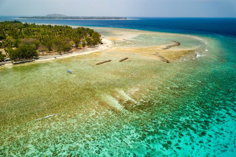 Aerial View of a Reef Table and Coral Reef Off a Tiny Tropical Island ...