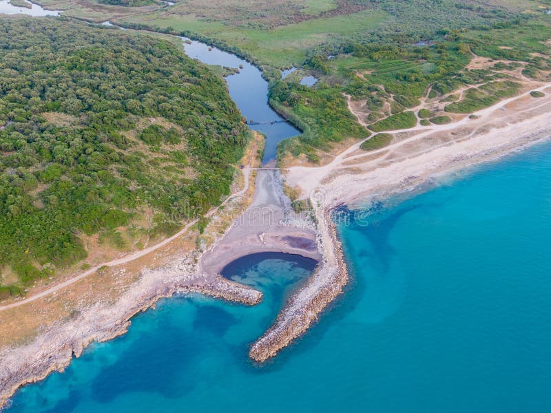 Aerial View of a River Meeting the Turquoise Ocean Stock Photo - Image ...