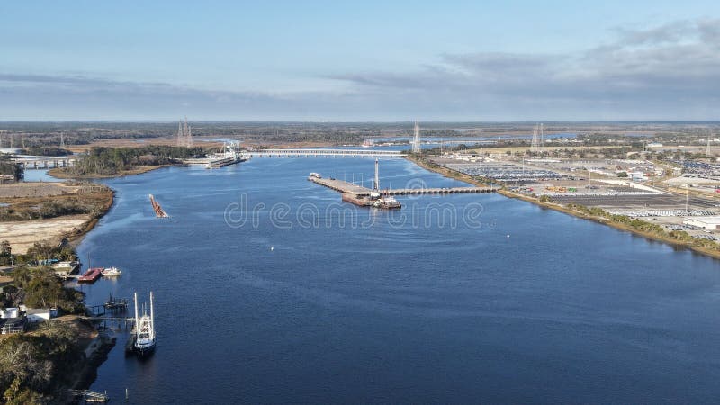 View of a River Port with Docked Ships and Industrial Facilities Under ...