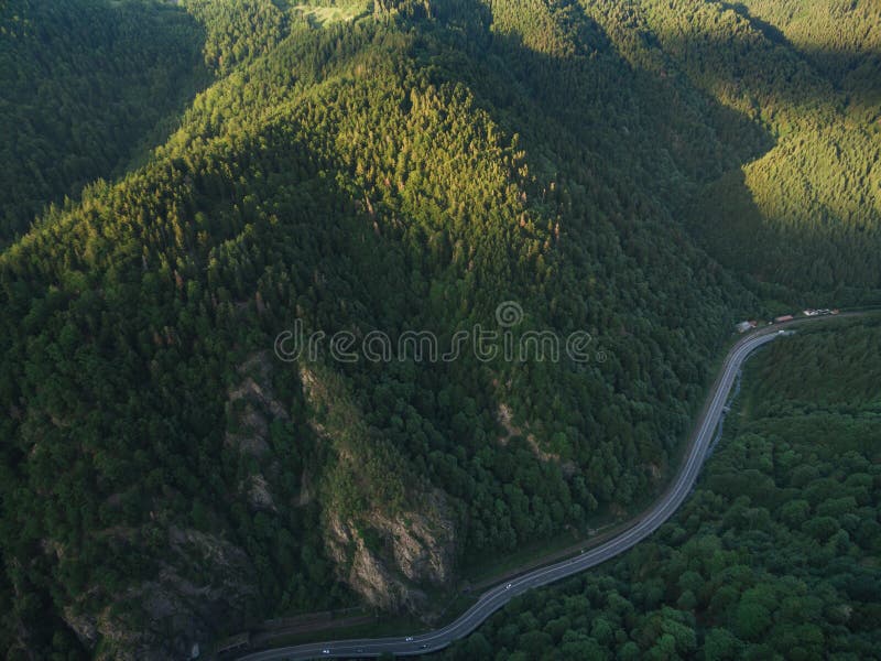 Aerial View of Road in Beautiful Mountain Forest on Sunset Stock Photo ...